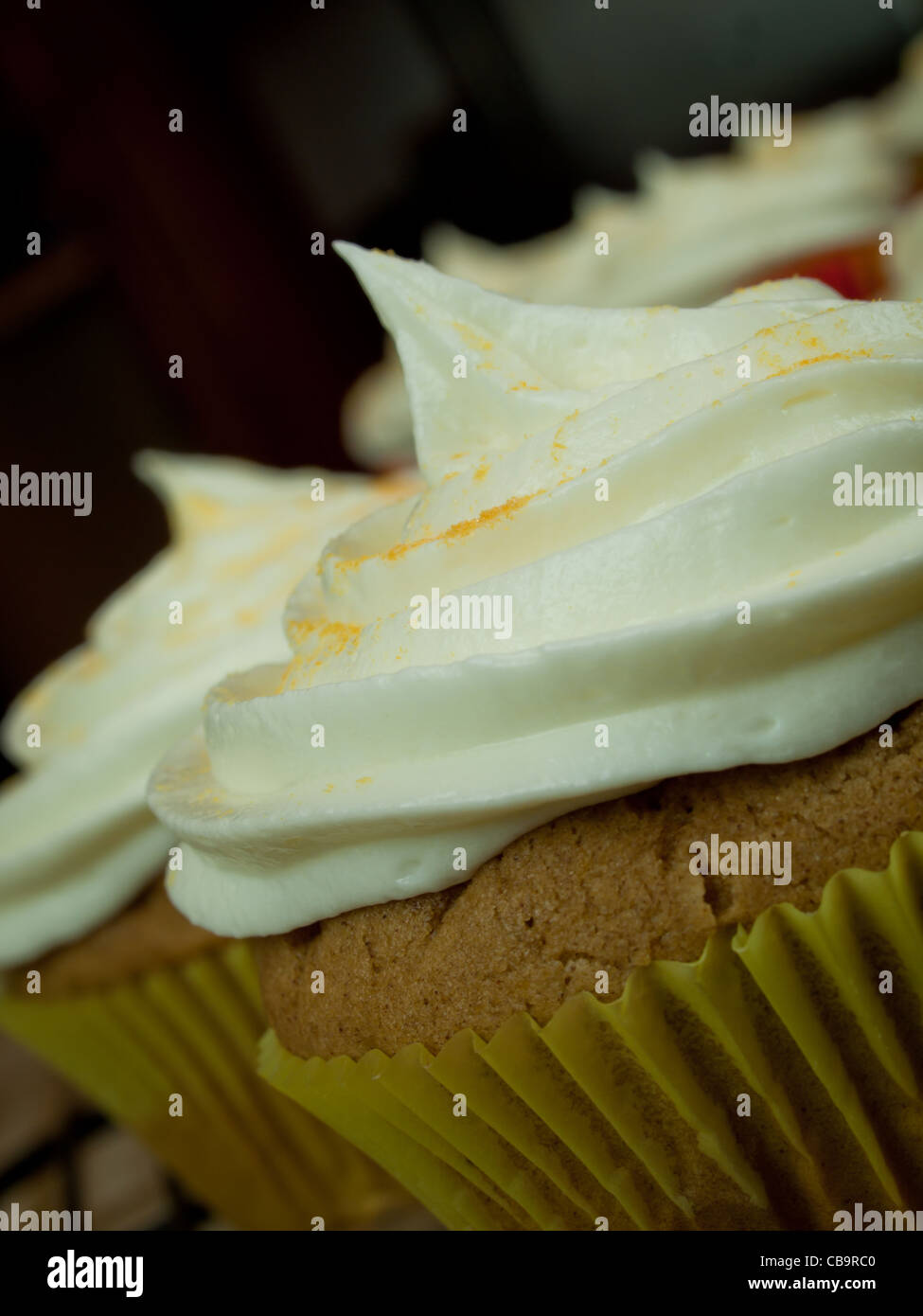 Baking pumpkin cupcakes for party Stock Photo - Alamy