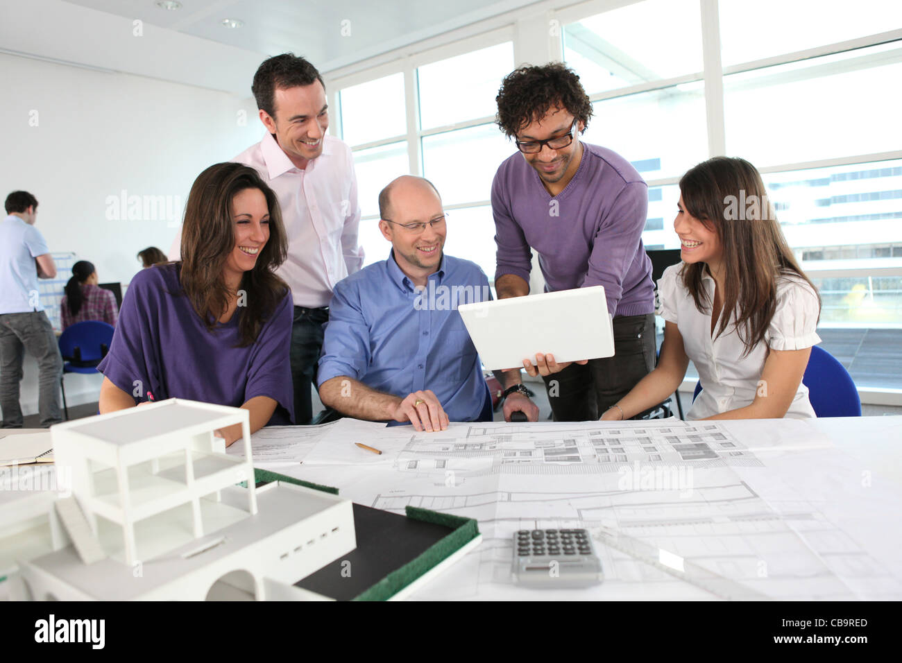 People working in an architect's office Stock Photo - Alamy