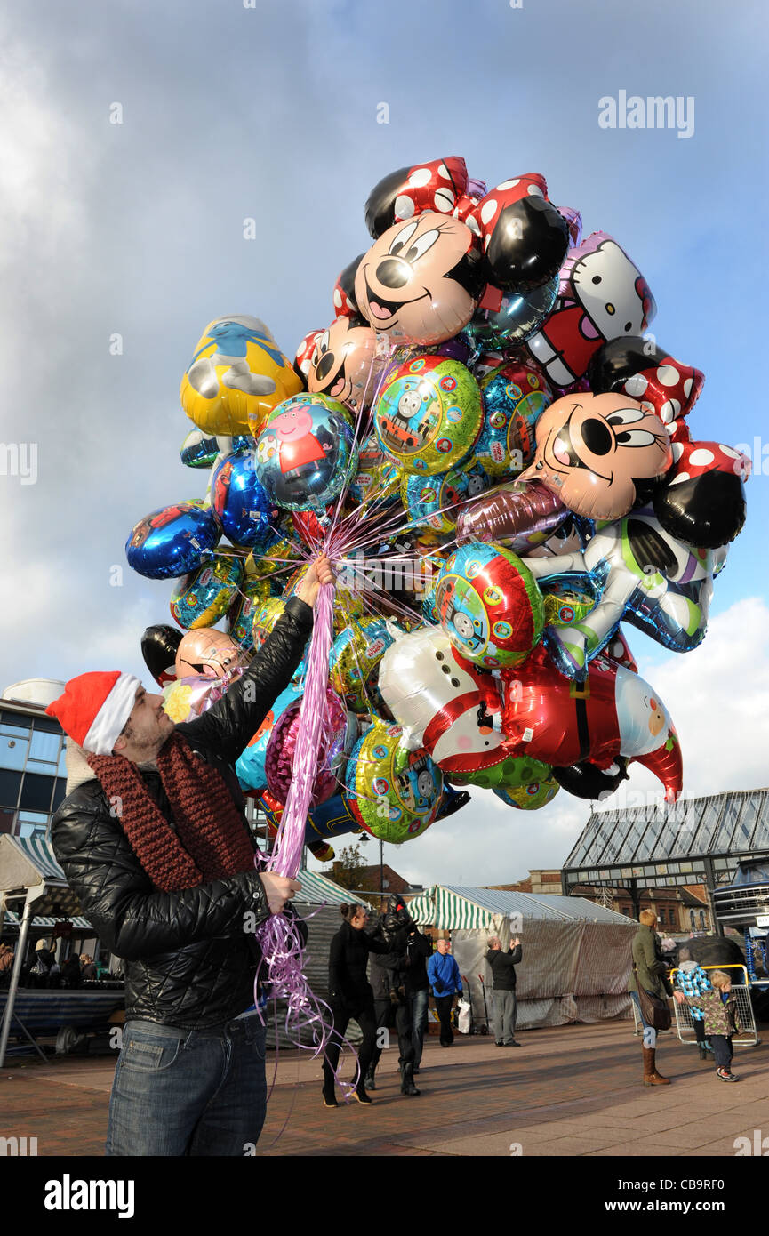 Man selling balloons hi-res stock photography and images - Alamy