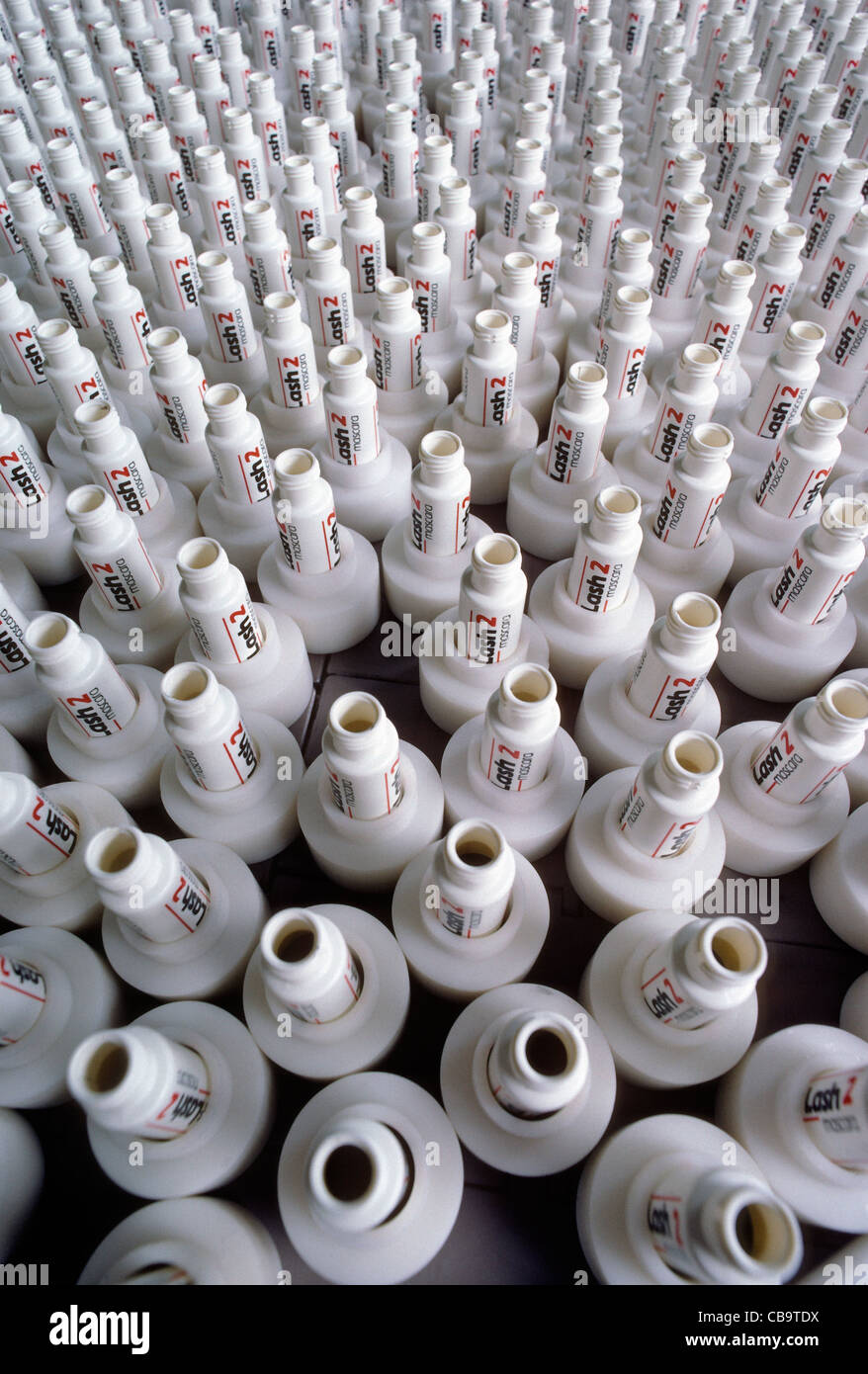 Containers of cosmetics on the assembly line Stock Photo - Alamy