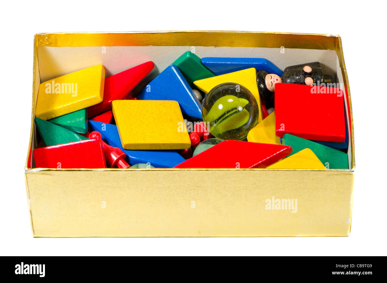 various playthings in the golden painted box Stock Photo - Alamy