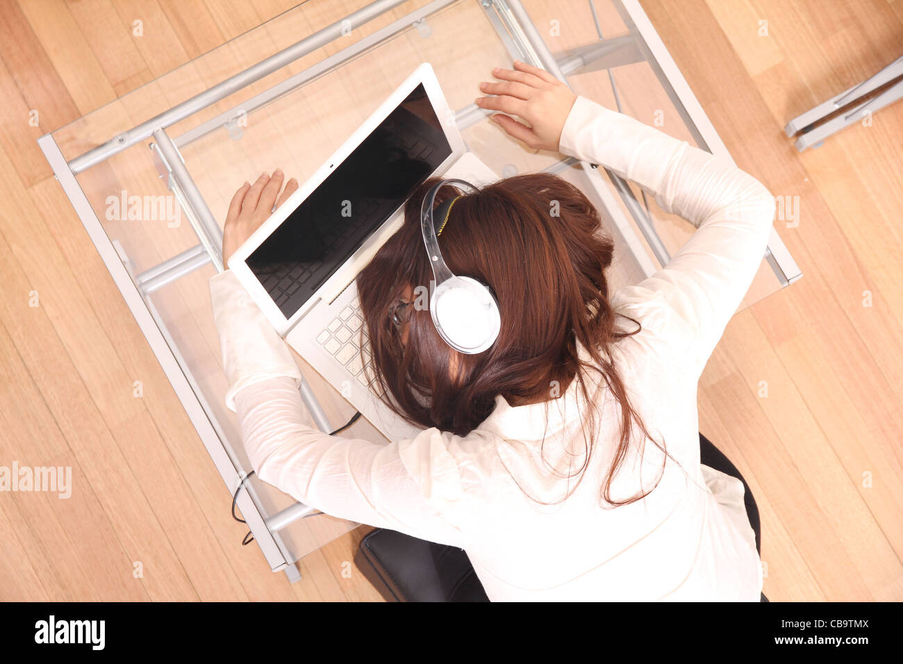 A woman sleeping on the Laptop Stock Photo - Alamy