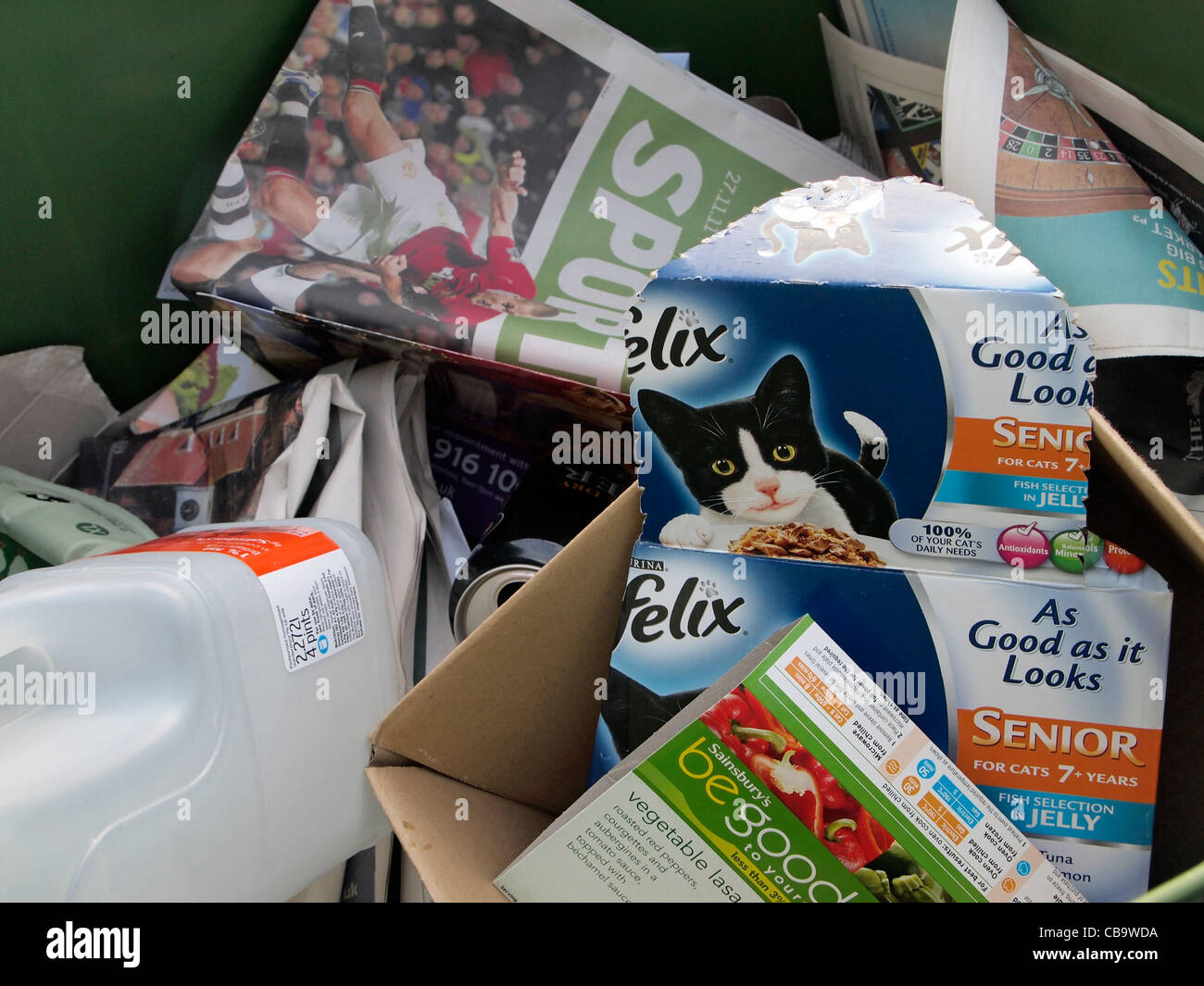 Co-mingled or dry mix recycling in a green wheelie bin as used in the ...