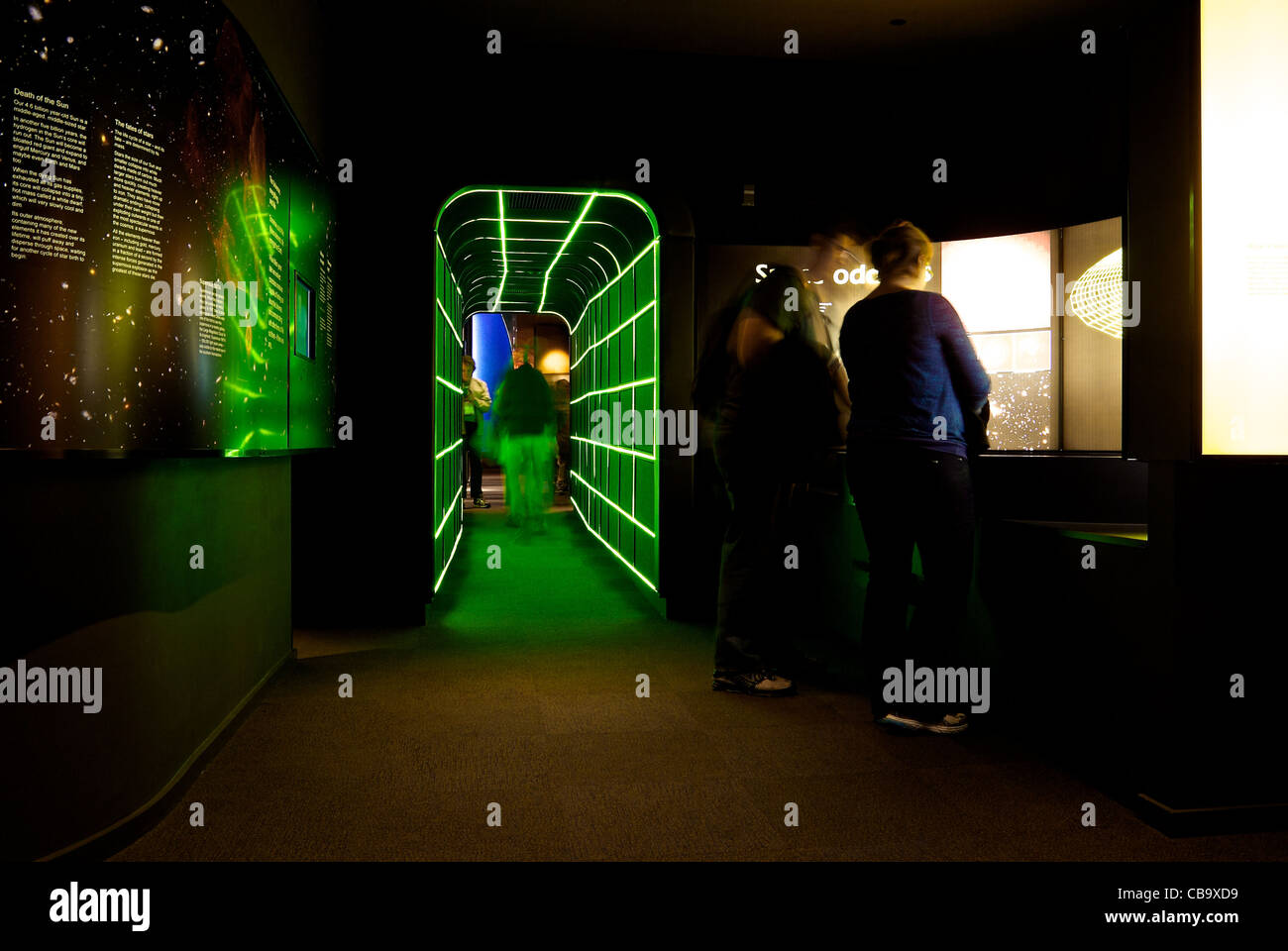 Visitors falling into black hole model in Solar System exhibition hall ...