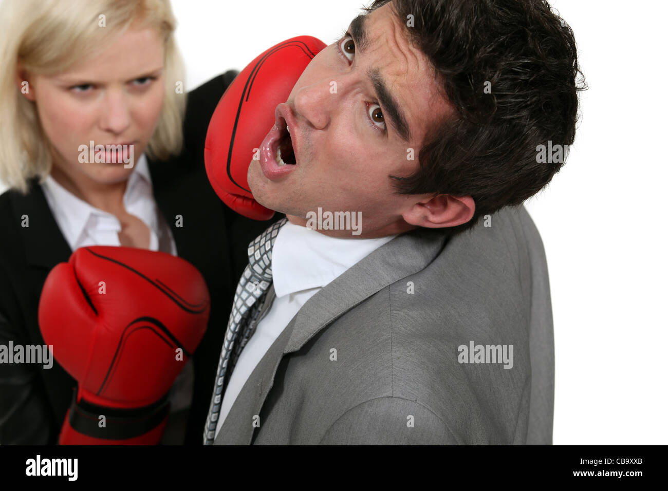 blonde businesswoman boxing a colleague Stock Photo - Alamy