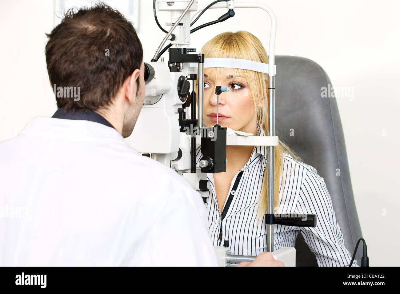 female patient is having a medical attendance at the optometrist Stock ...
