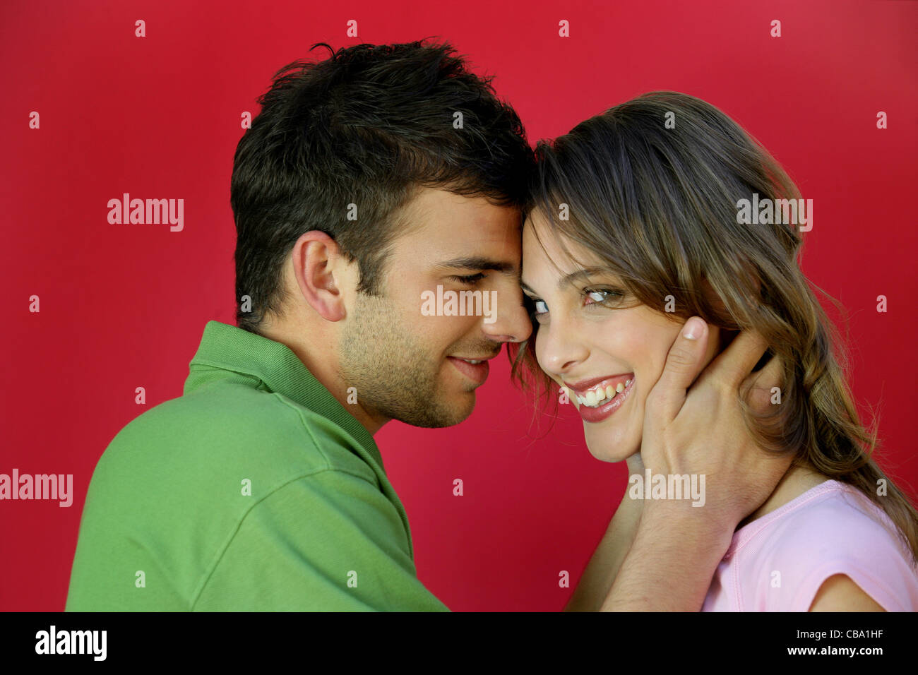 A loving couple nestling together Stock Photo - Alamy