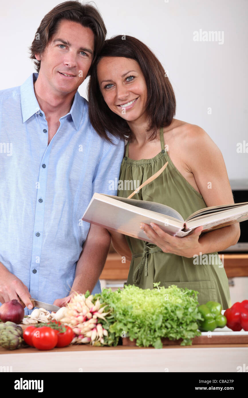 portrait of a couple cooking Stock Photo - Alamy