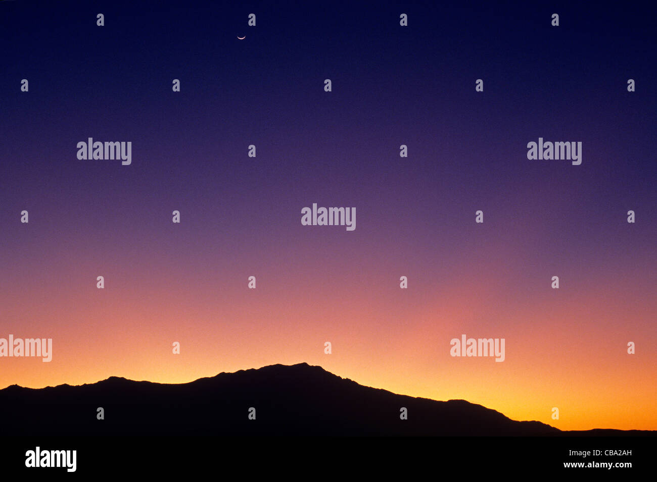 Sunset Mount San Jacinto with crescent moon Palm Springs California USA ...