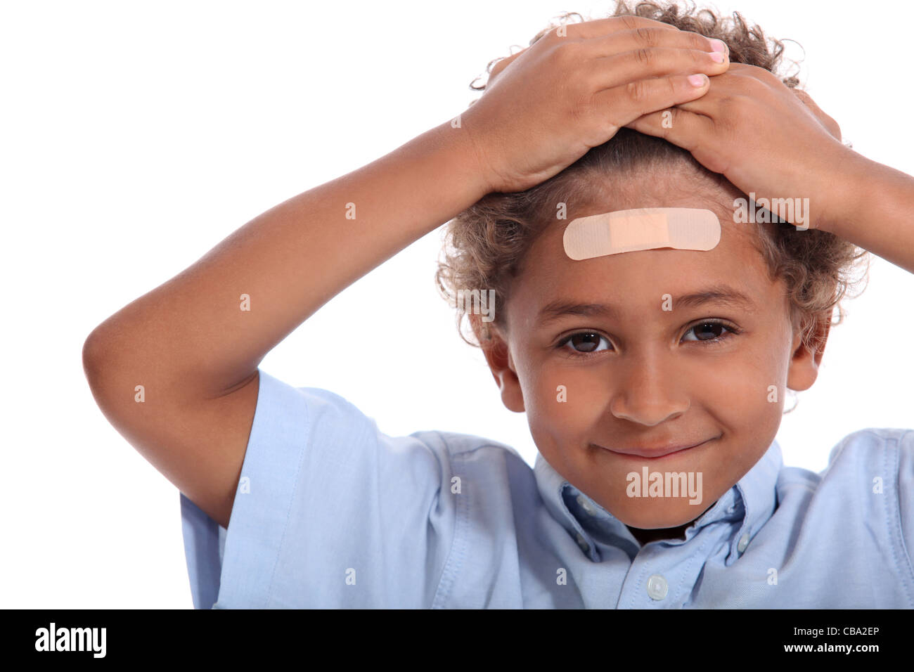 Little boy with plaster on head Stock Photo - Alamy