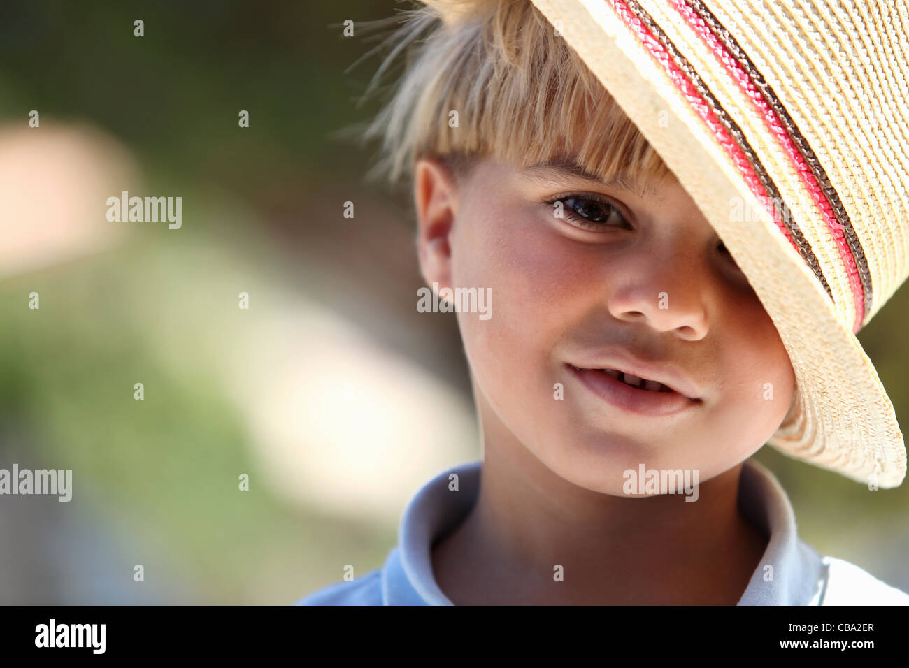 Little boy wearing straw hat Stock Photo - Alamy