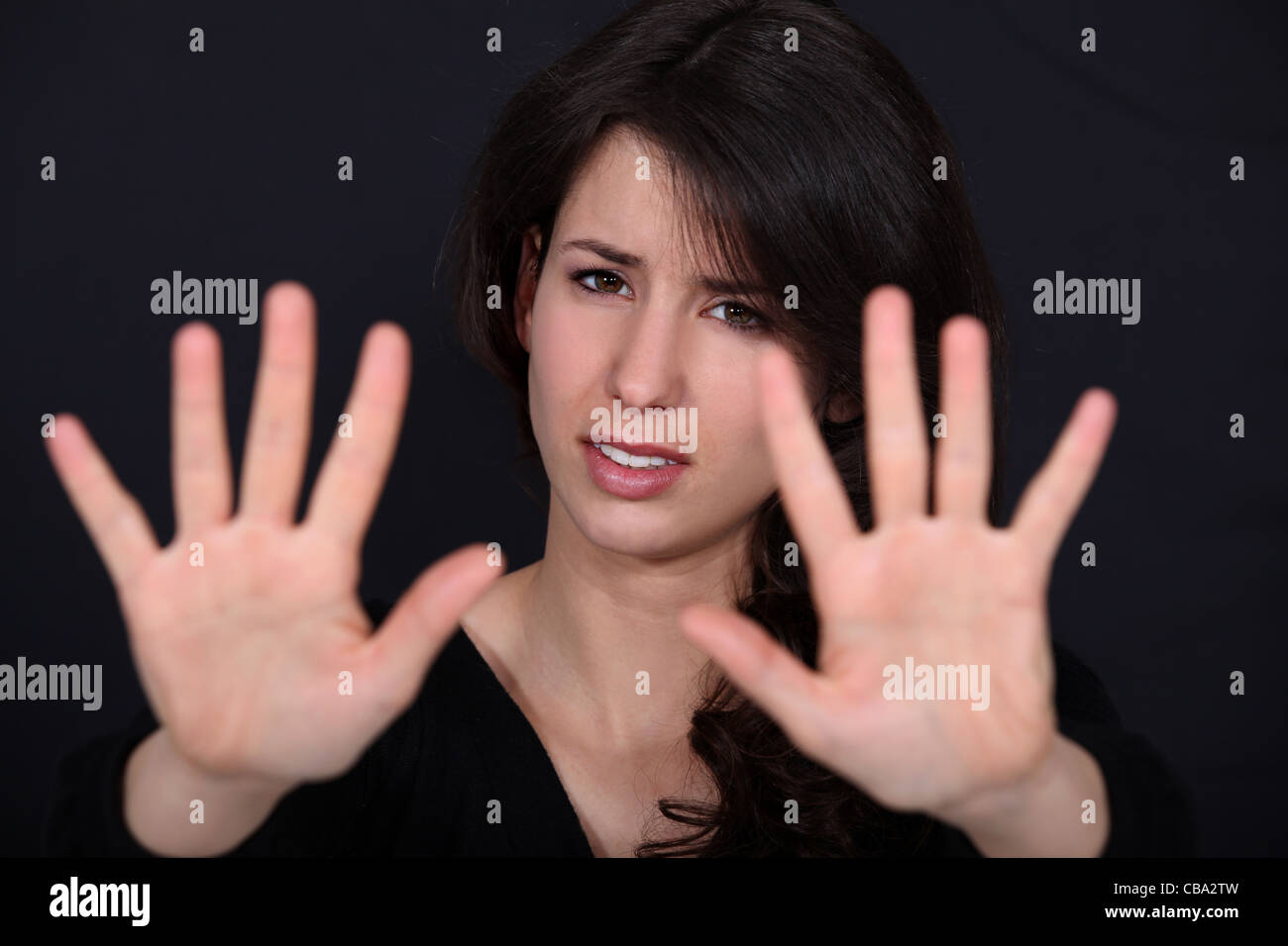 woman making a stop sign gesture with her hands Stock Photo - Alamy