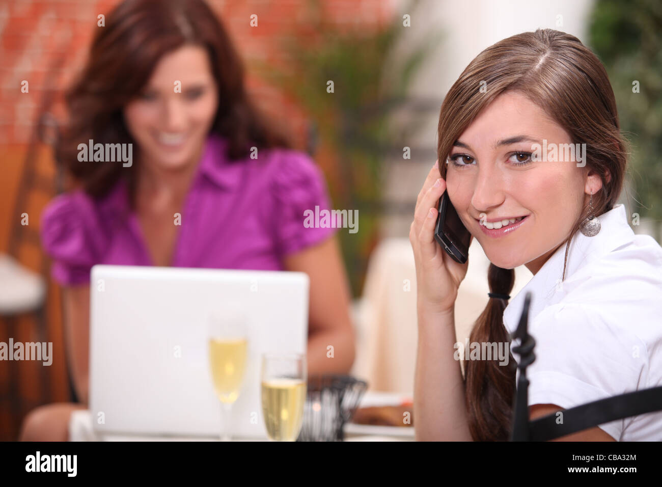 Two women at restaurant hi-res stock photography and images - Alamy