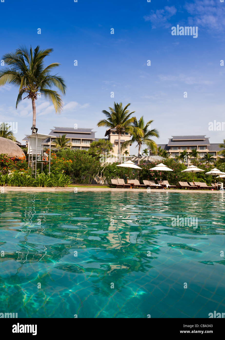 Beautiful swimming pool at hotel garden, Sanya, Hainan Island, China ...