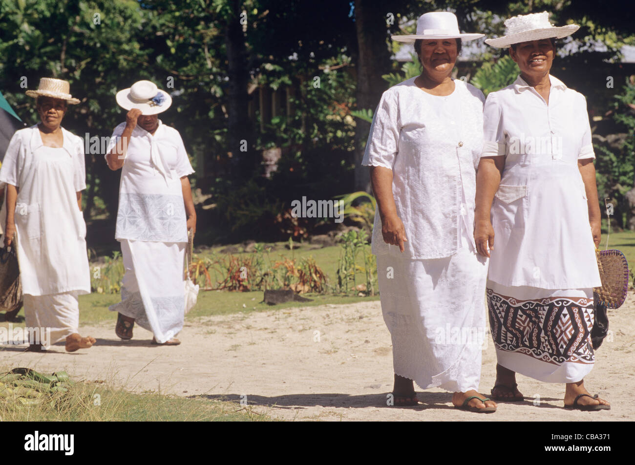 Western Samoa, Siumu Village villagers heading to church Stock Photo ...