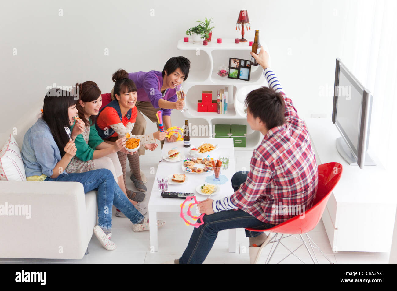 Young people chatting Stock Photo - Alamy