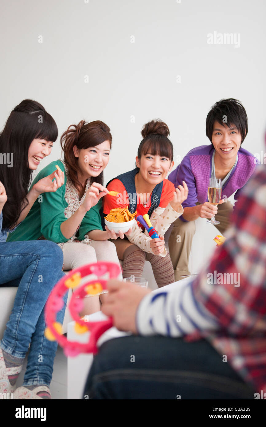 Young people chatting Stock Photo - Alamy