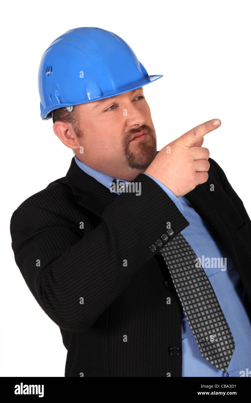 a construction manager pointing his finger Stock Photo - Alamy
