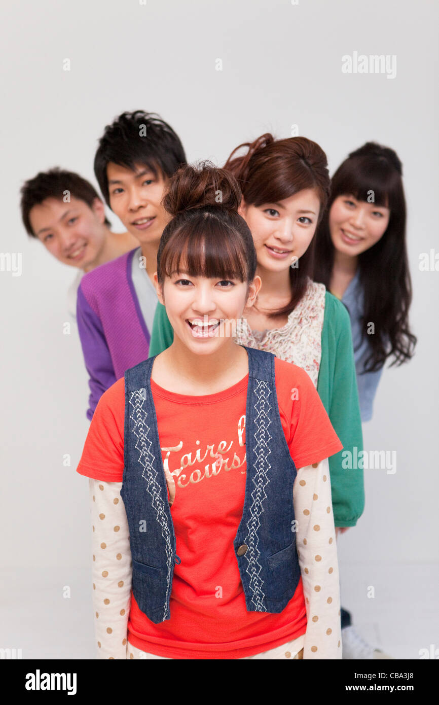 Young people smiling Stock Photo - Alamy