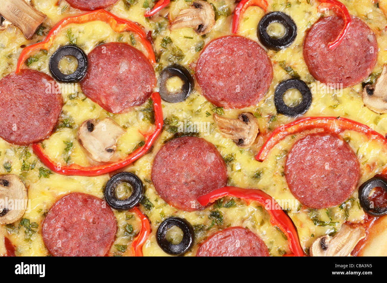 Mushroom and pepperoni pizza food background Stock Photo - Alamy