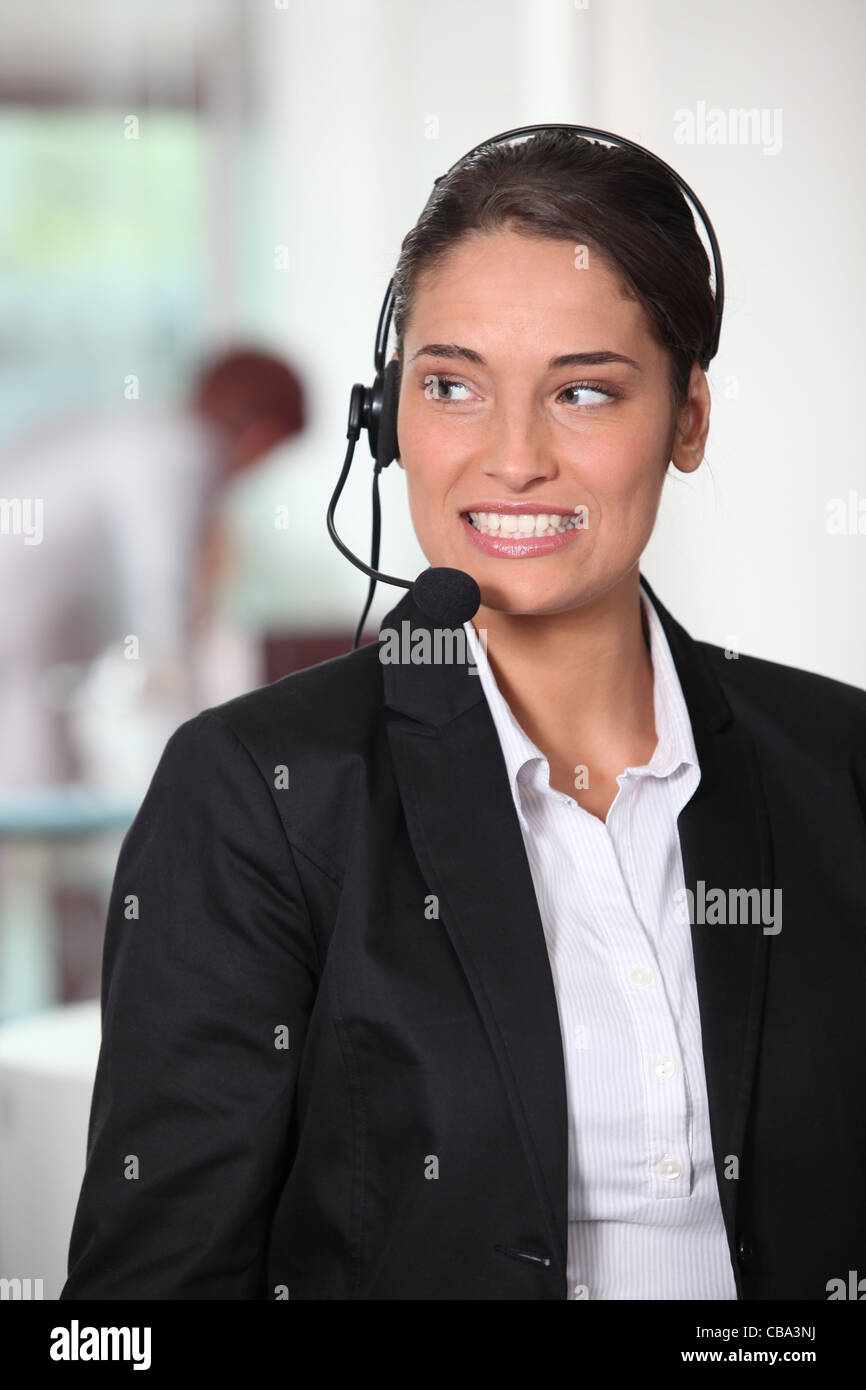Customer service woman smiling Stock Photo - Alamy