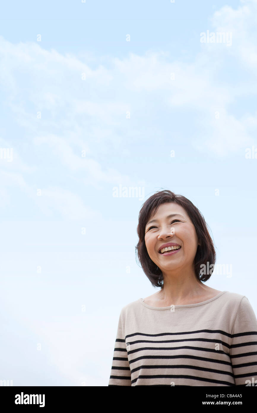Smiling mature woman Stock Photo - Alamy
