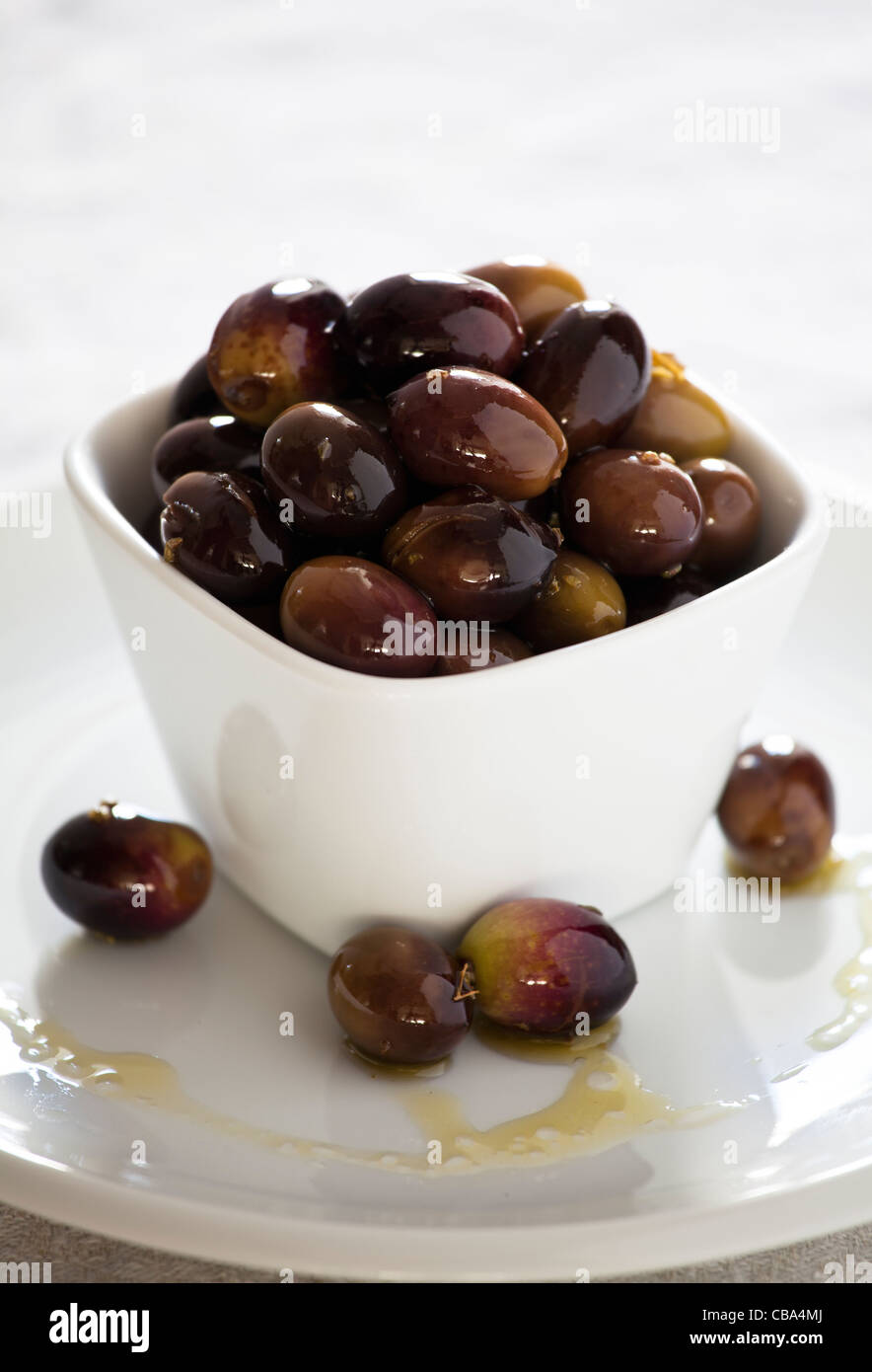 Close up photograph of fresh olives in a bowl Stock Photo - Alamy