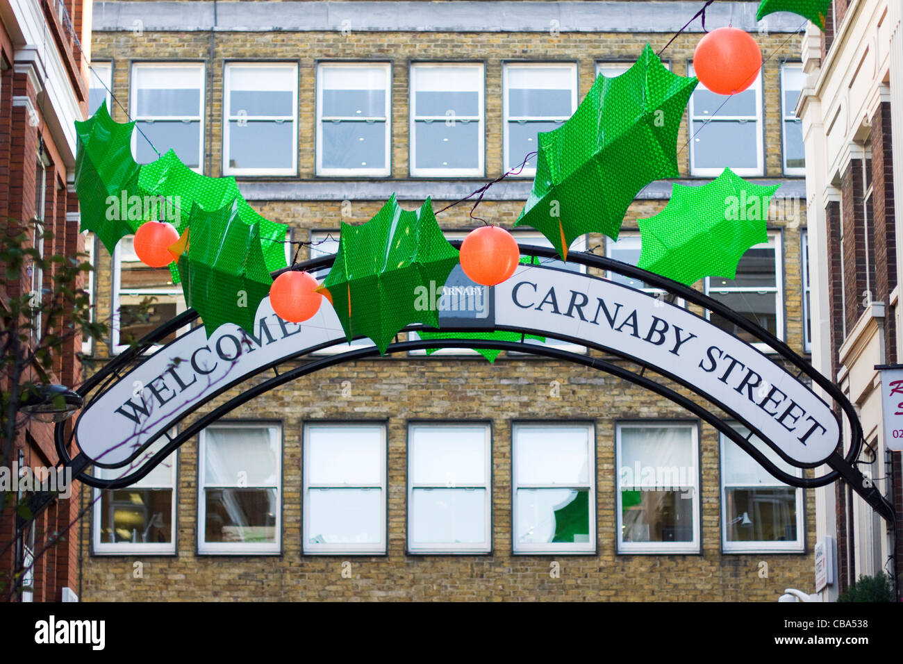 Welcome to Carnaby Street sign with Christmas Decorations Stock Photo ...
