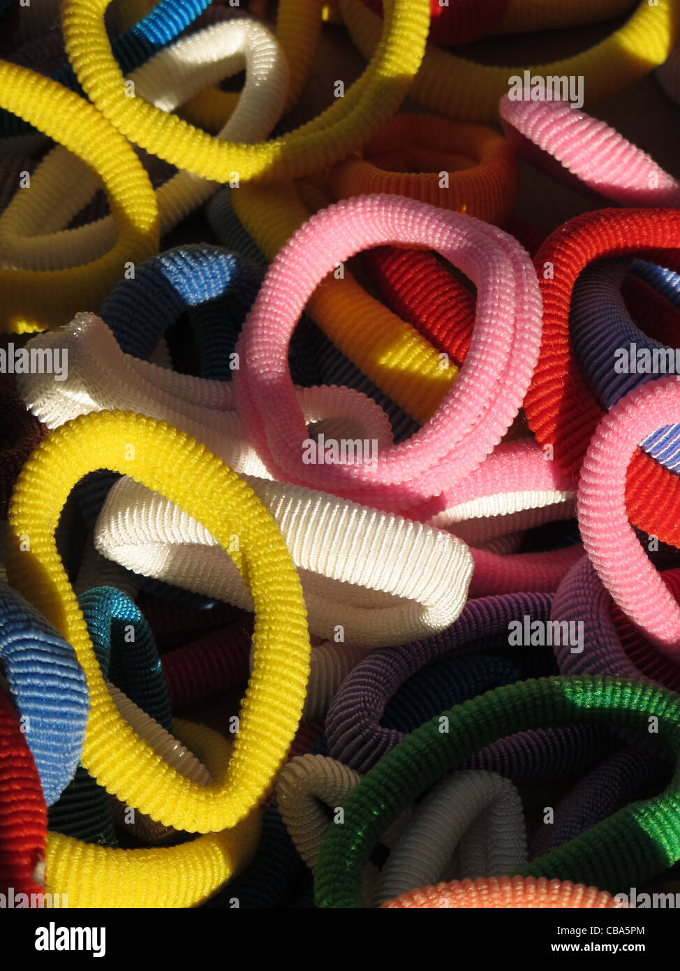 selection of colourful hair elastic bands on market stall Stock Photo ...