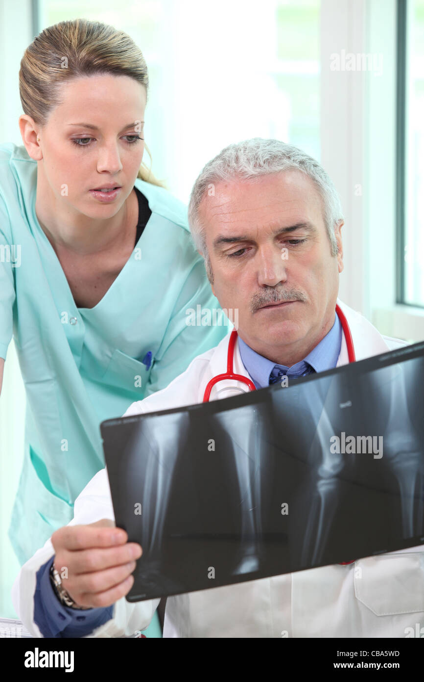 Radiologist and assistant Stock Photo - Alamy