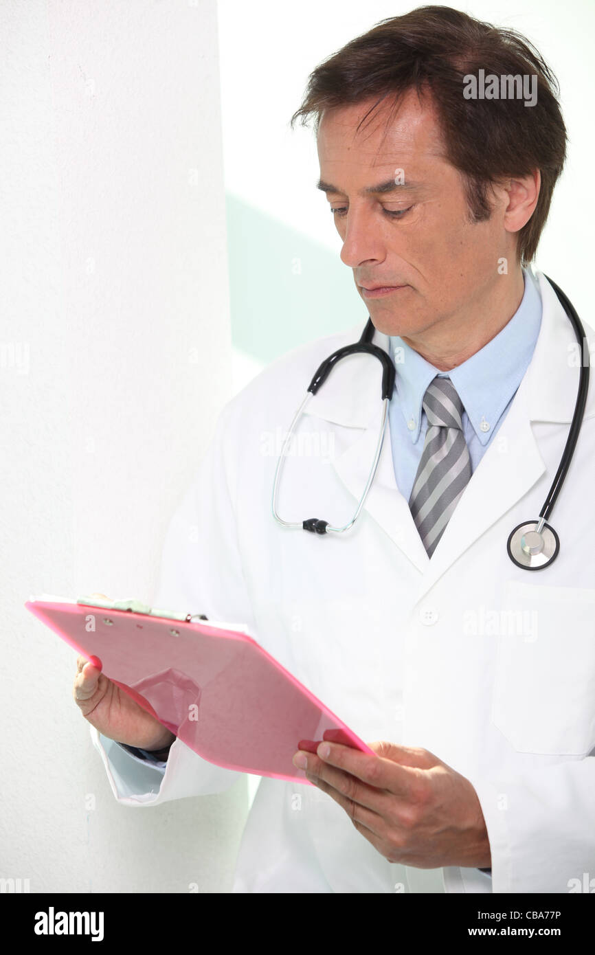 Medical reading report Stock Photo - Alamy
