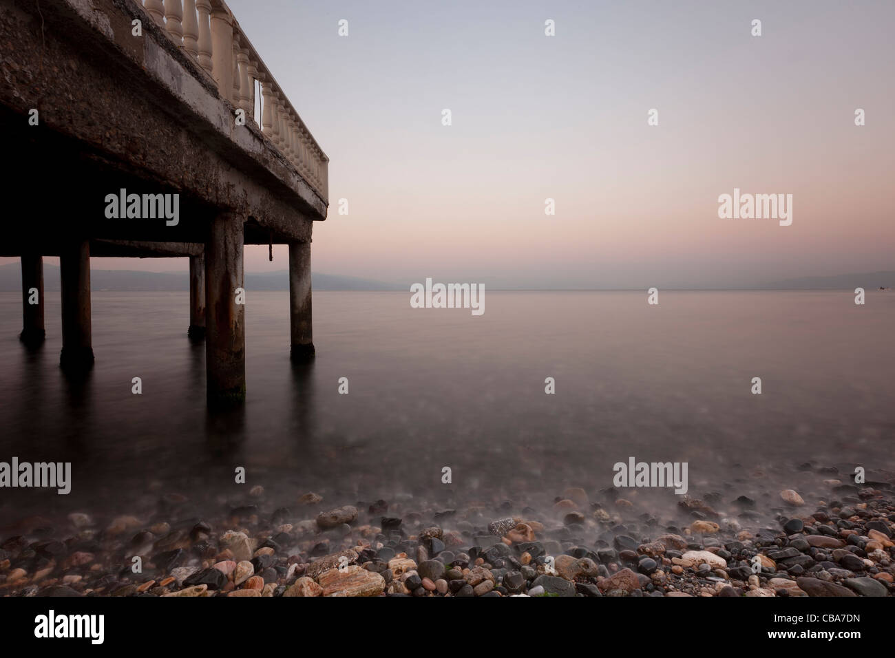 Pier in the water Stock Photo - Alamy