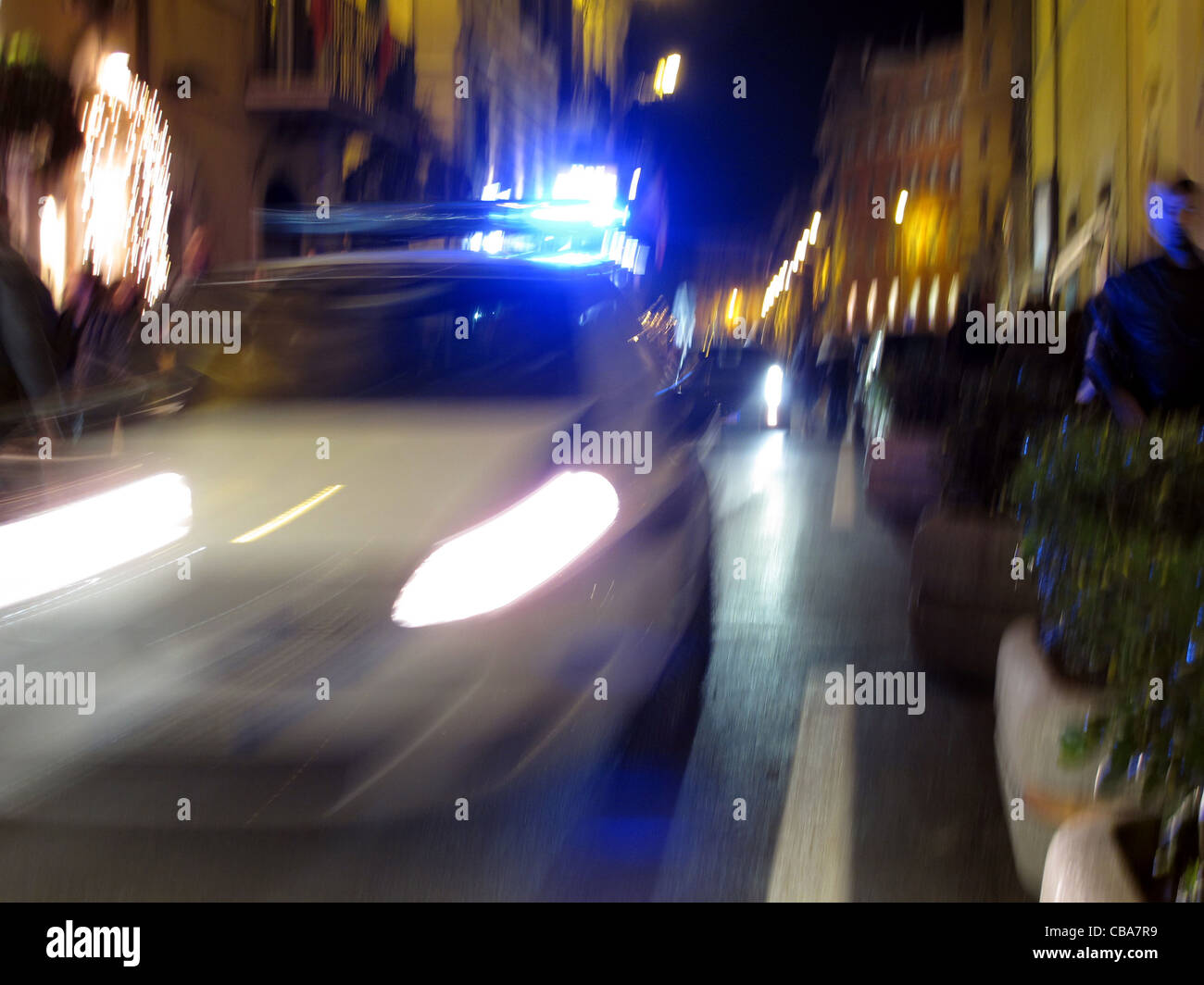 fast police car in street road in city town rome italy Stock Photo - Alamy