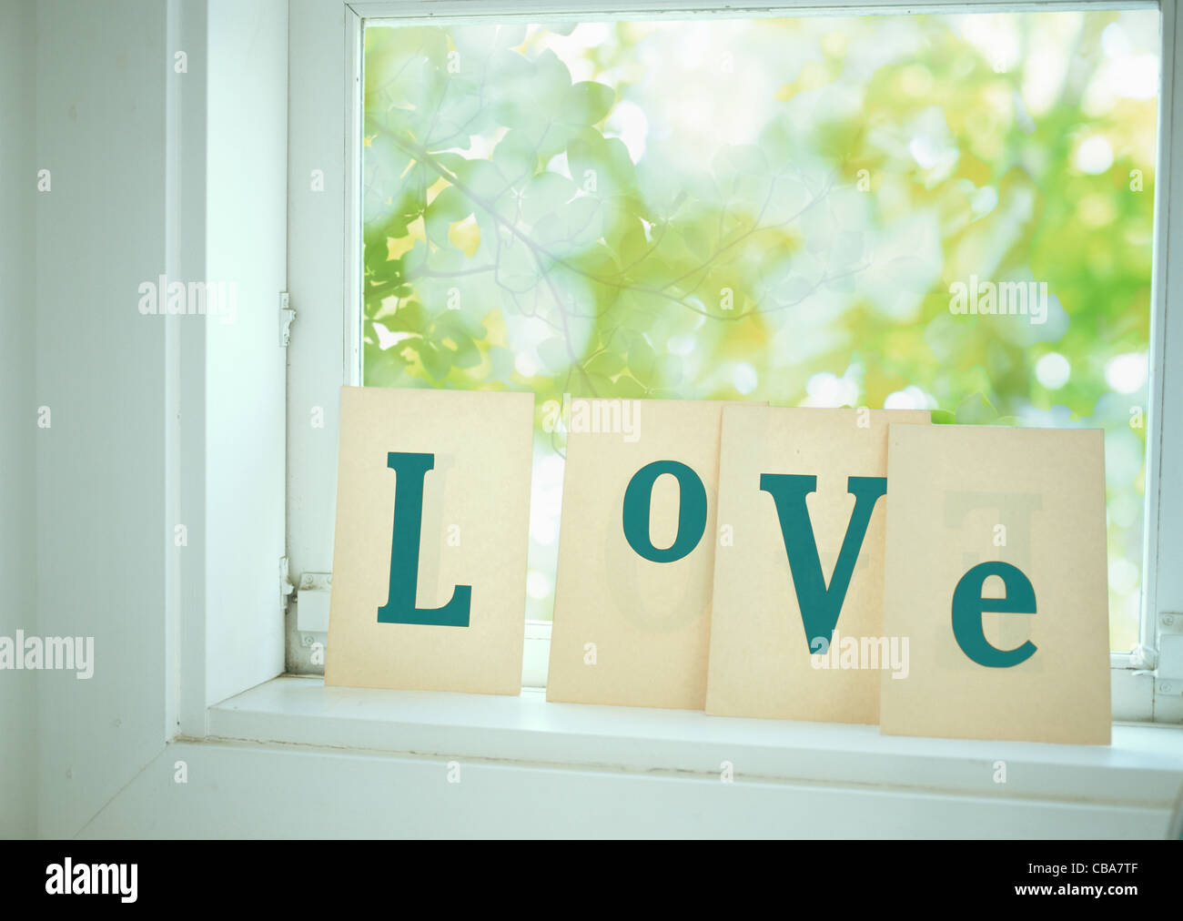 LOVE card on window side Stock Photo - Alamy