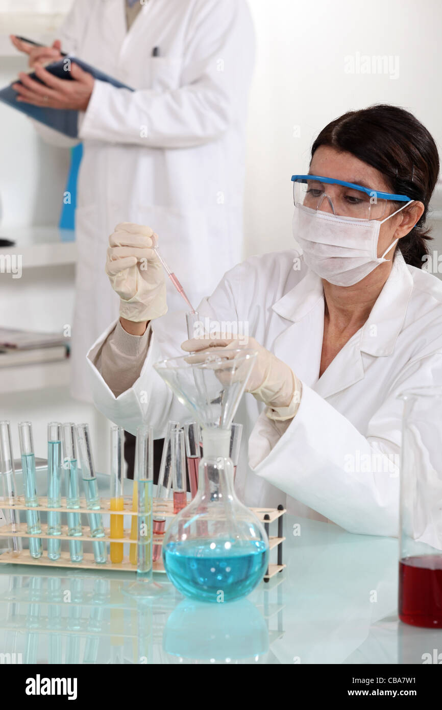 Two scientists in laboratory Stock Photo - Alamy