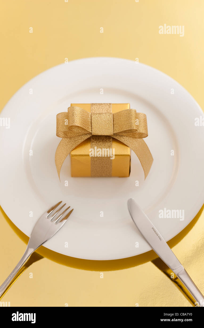 Gift Box on Plate Stock Photo - Alamy