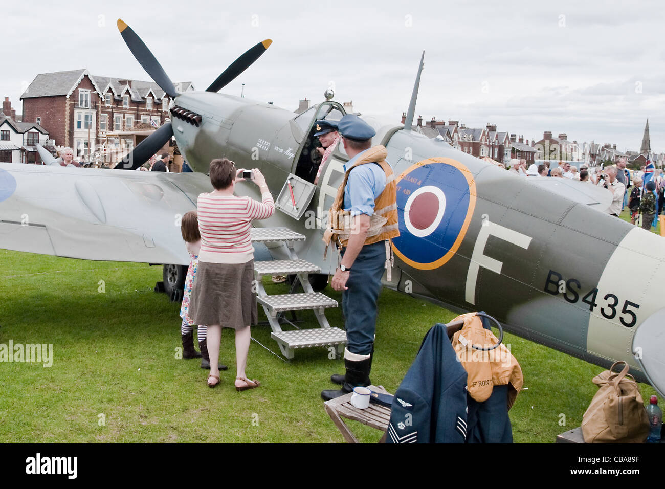 Families examining "The Lytham Spitfire" replica at a public display on ...