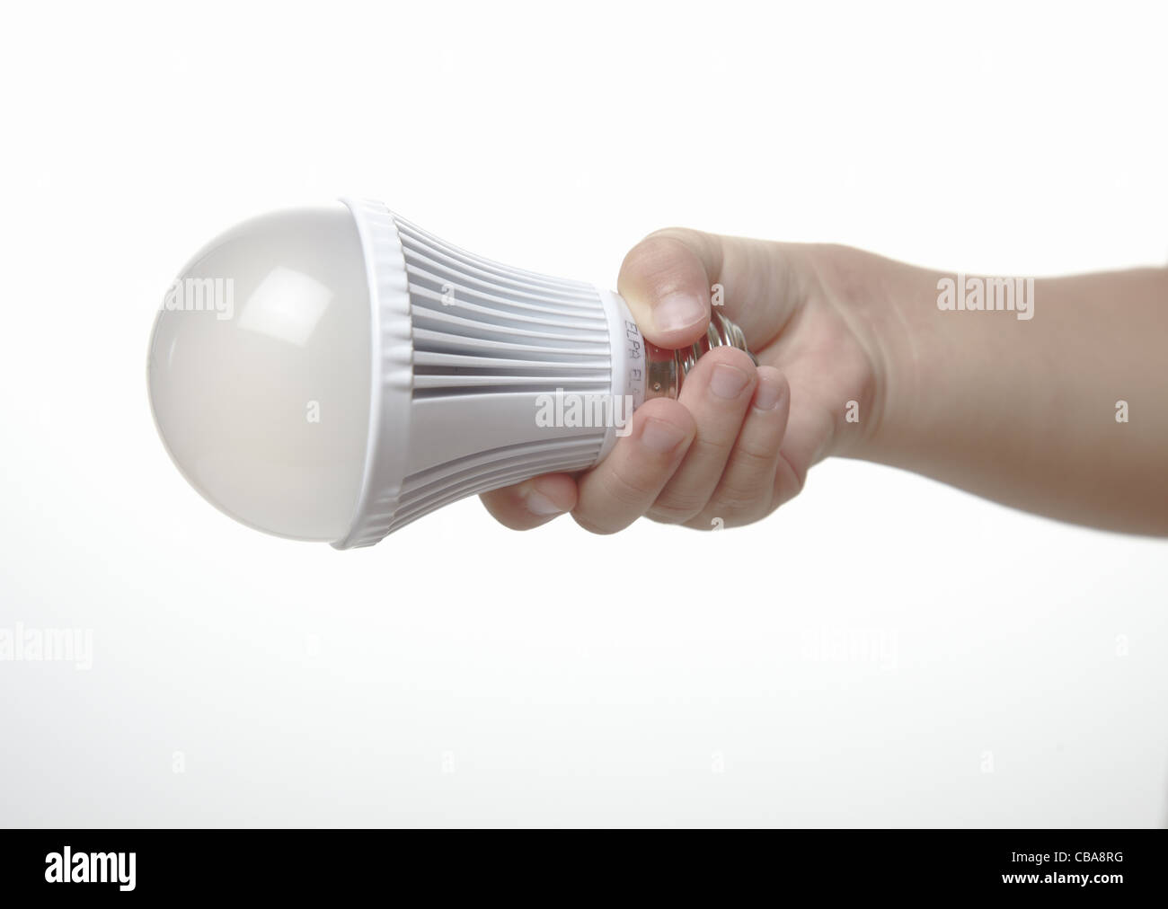 Girl's hand holding a LED bulb Stock Photo - Alamy
