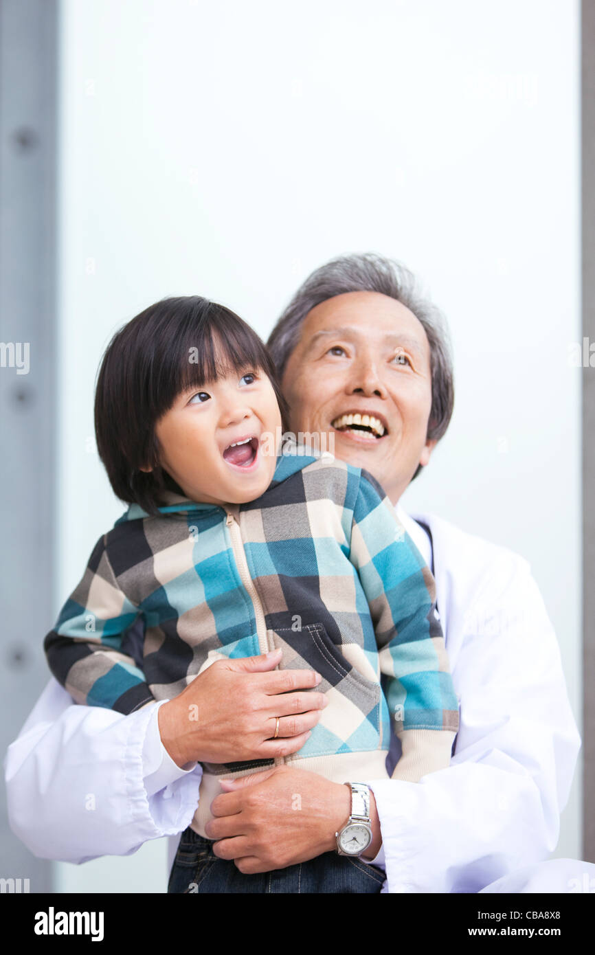 Male Doctor and Boy Stock Photo - Alamy
