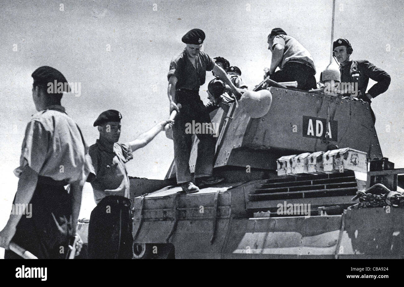 British WW11 A9 Valentine cruiser tank receiving fresh ammunition ...
