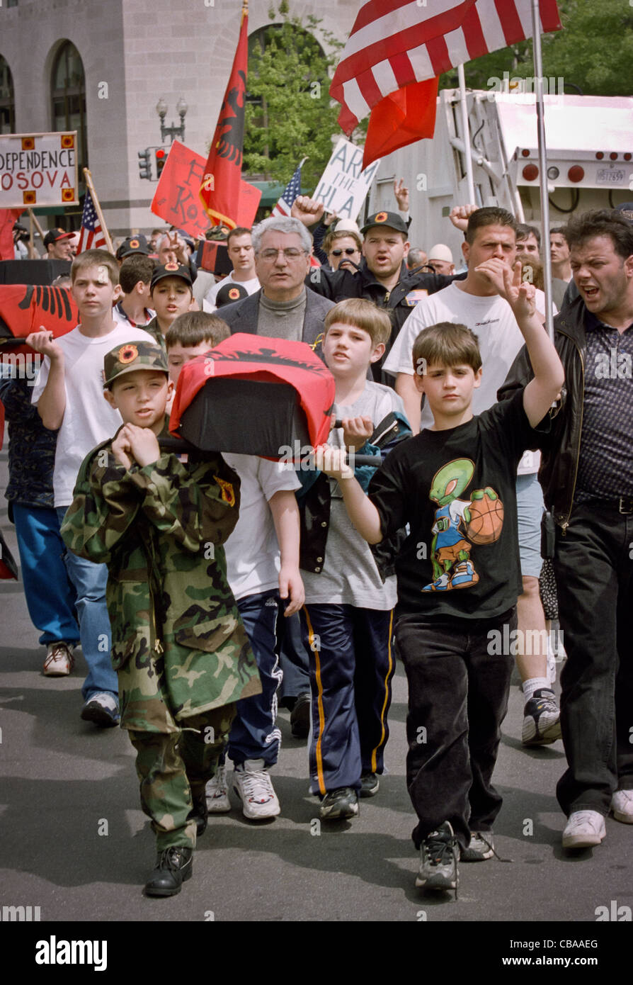 Protesters demanding an independent Kosovo march past the White House ...