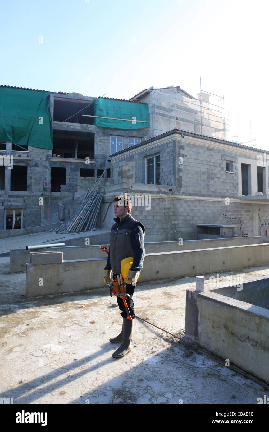 craftsman on a construction site Stock Photo - Alamy