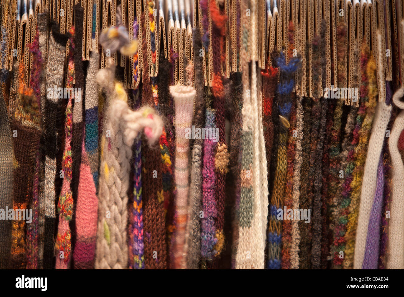 Woolen clothing on show rack, on sale, in Tokyo, Japan Stock Photo - Alamy