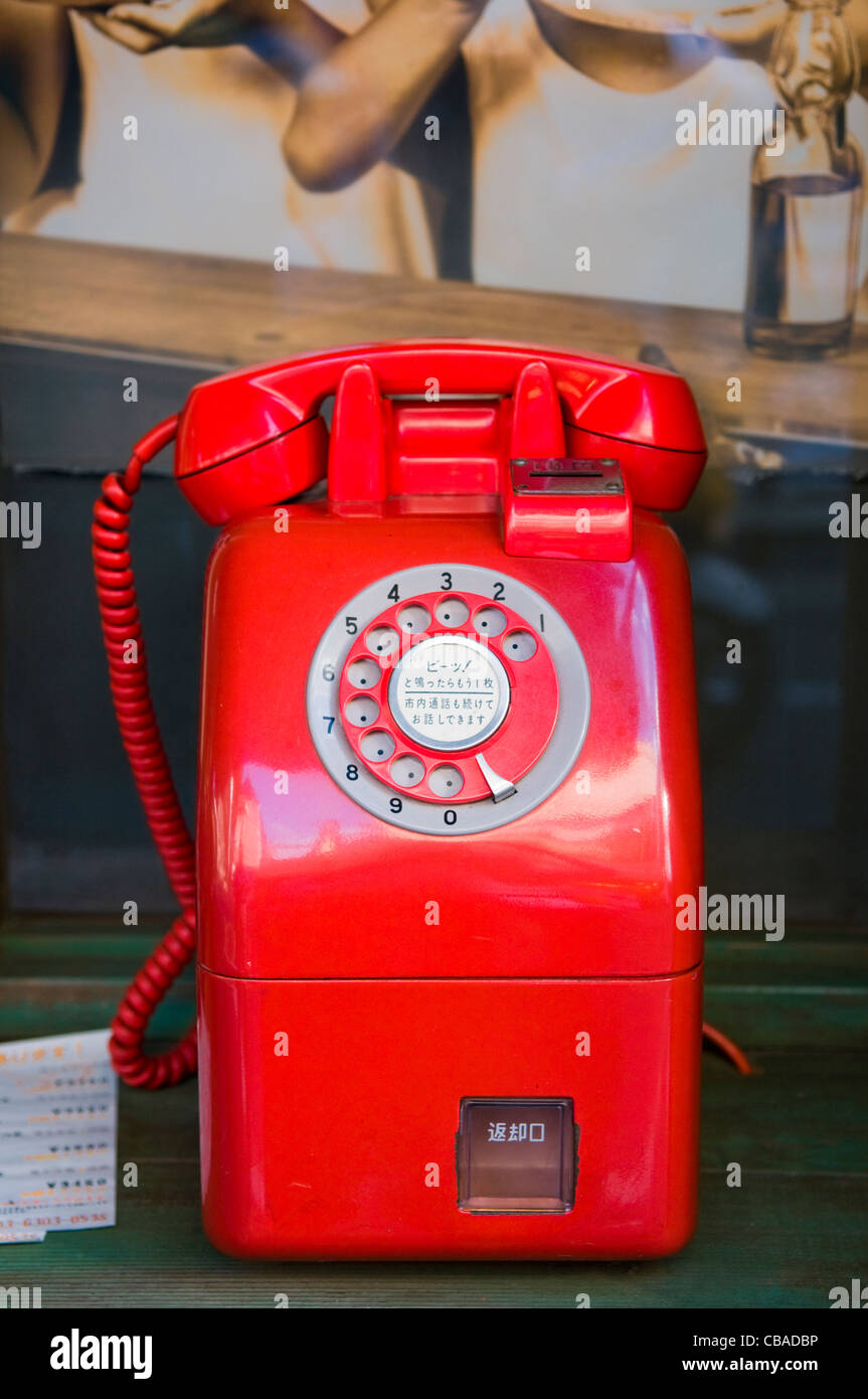 An old fashioned rotary pay phone in Tokyo Japan Stock Photo - Alamy