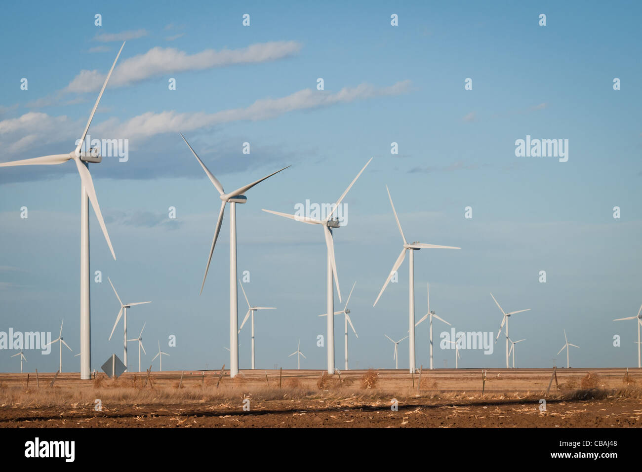 Wind turbines farm at sunset in Limon, Colorado Stock Photo - Alamy