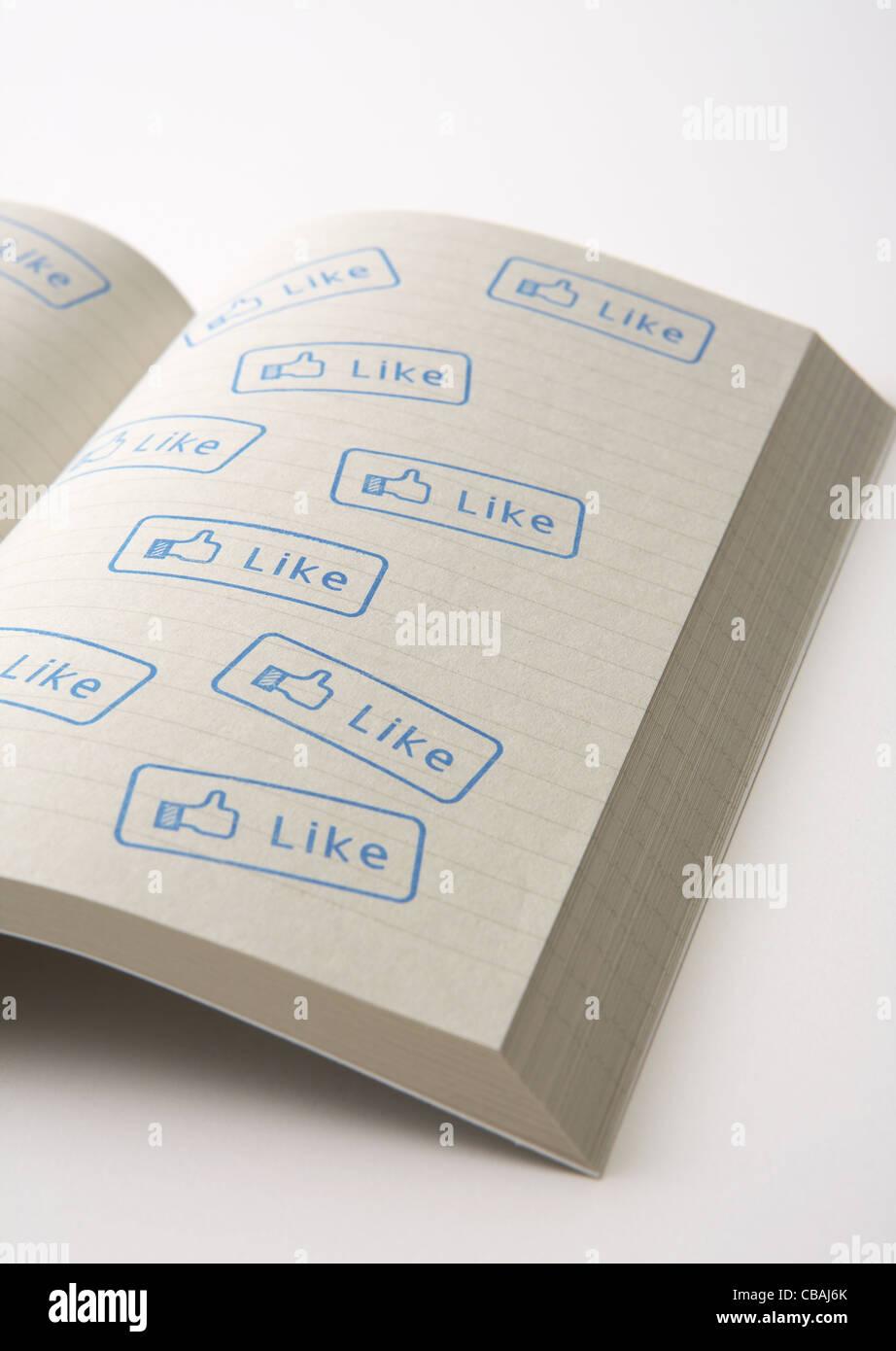 Notebook with "like" stamps Stock Photo - Alamy