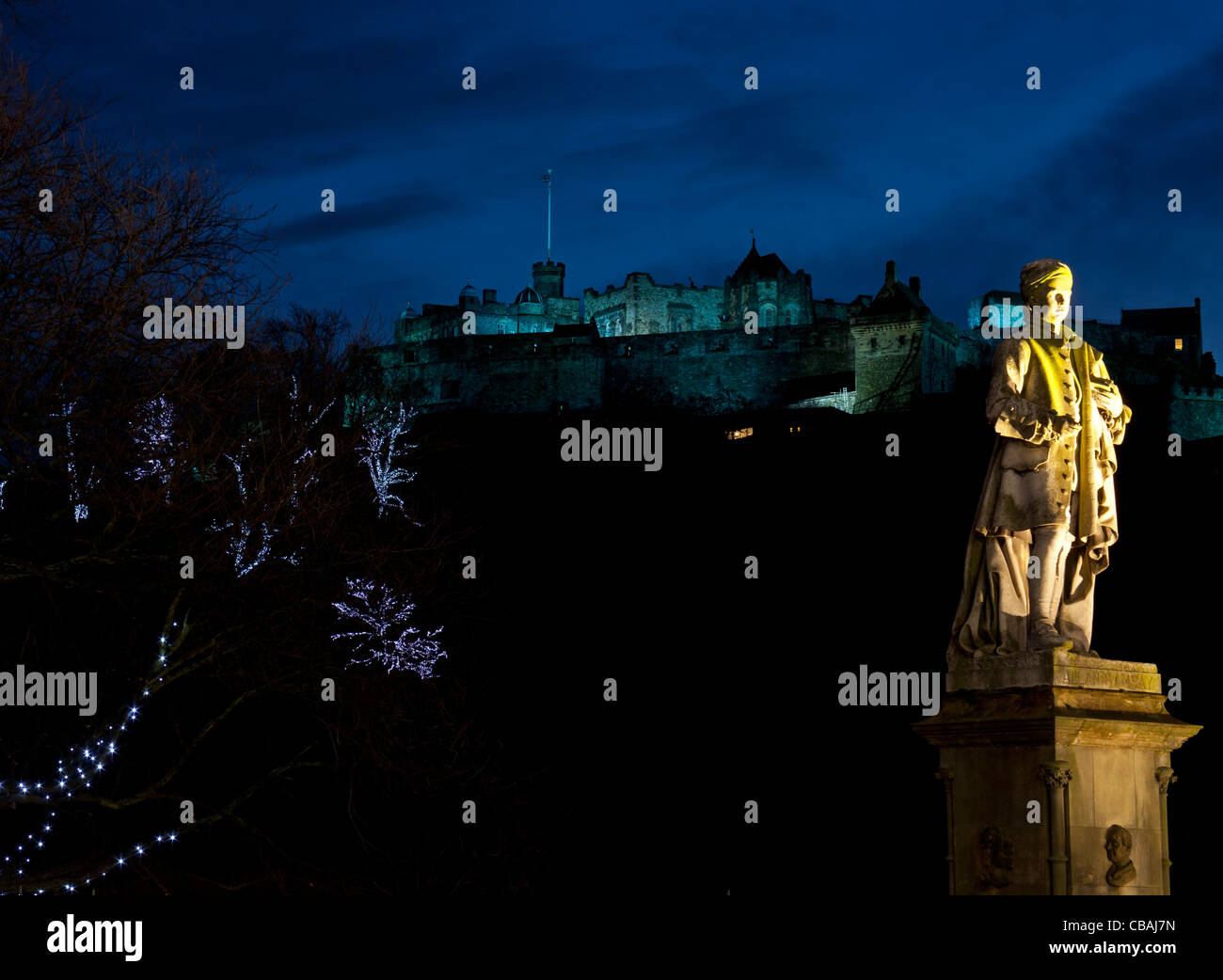 Illuminated Allan Ramsay Statue with Edinburgh Castle in background ...