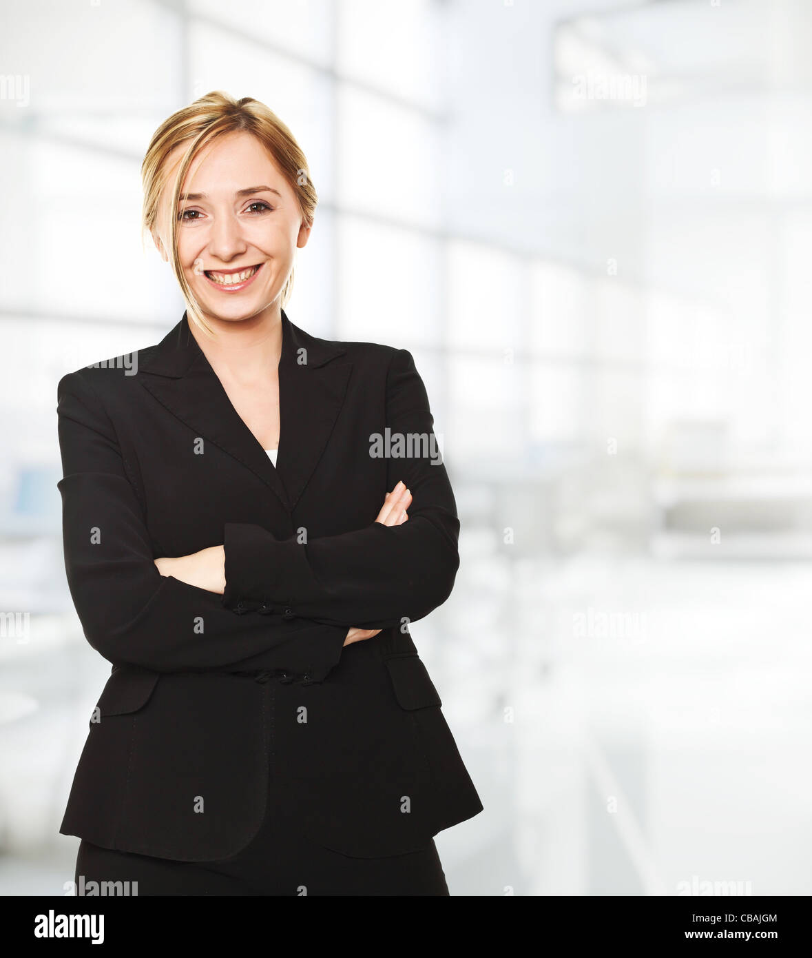 smiling woman portrait in modern office Stock Photo - Alamy