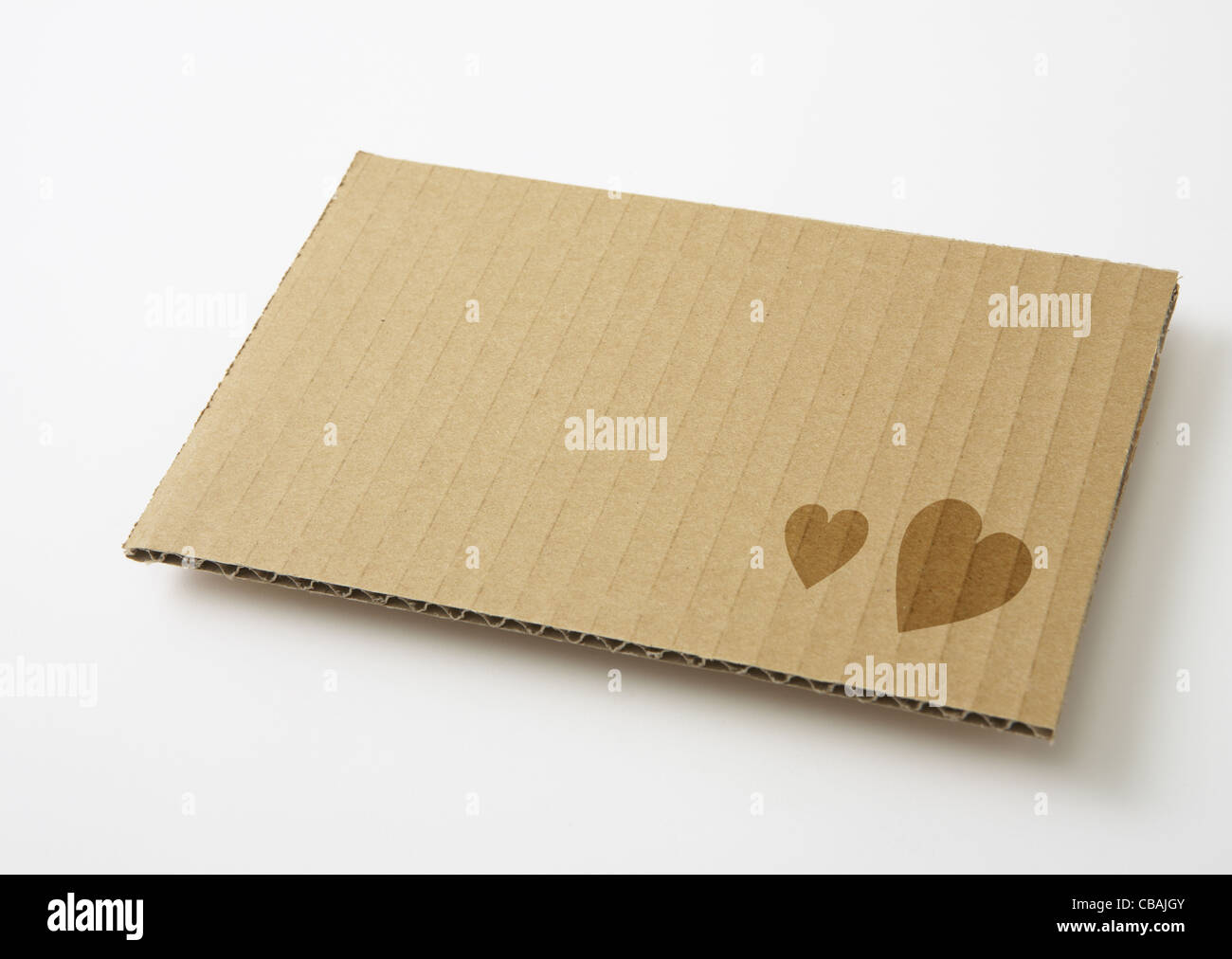 Cardboard with heart pattern Stock Photo - Alamy