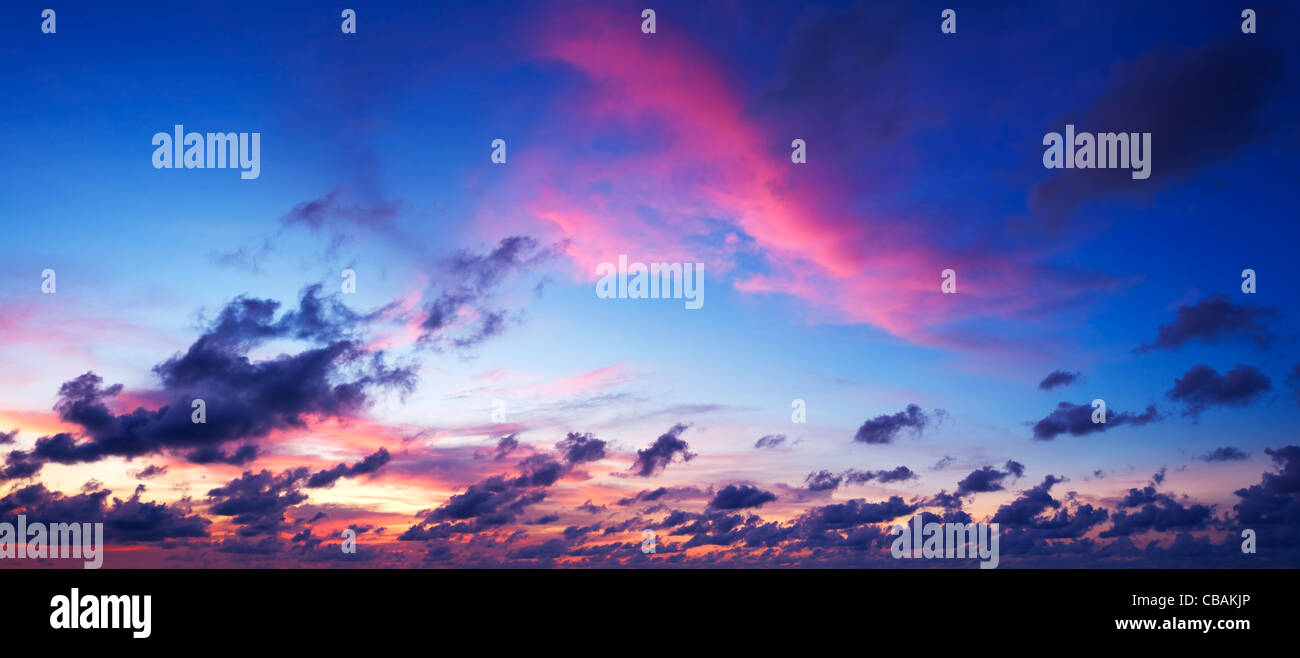 Spectacular sky at sunset time. Panoramic shot Stock Photo - Alamy